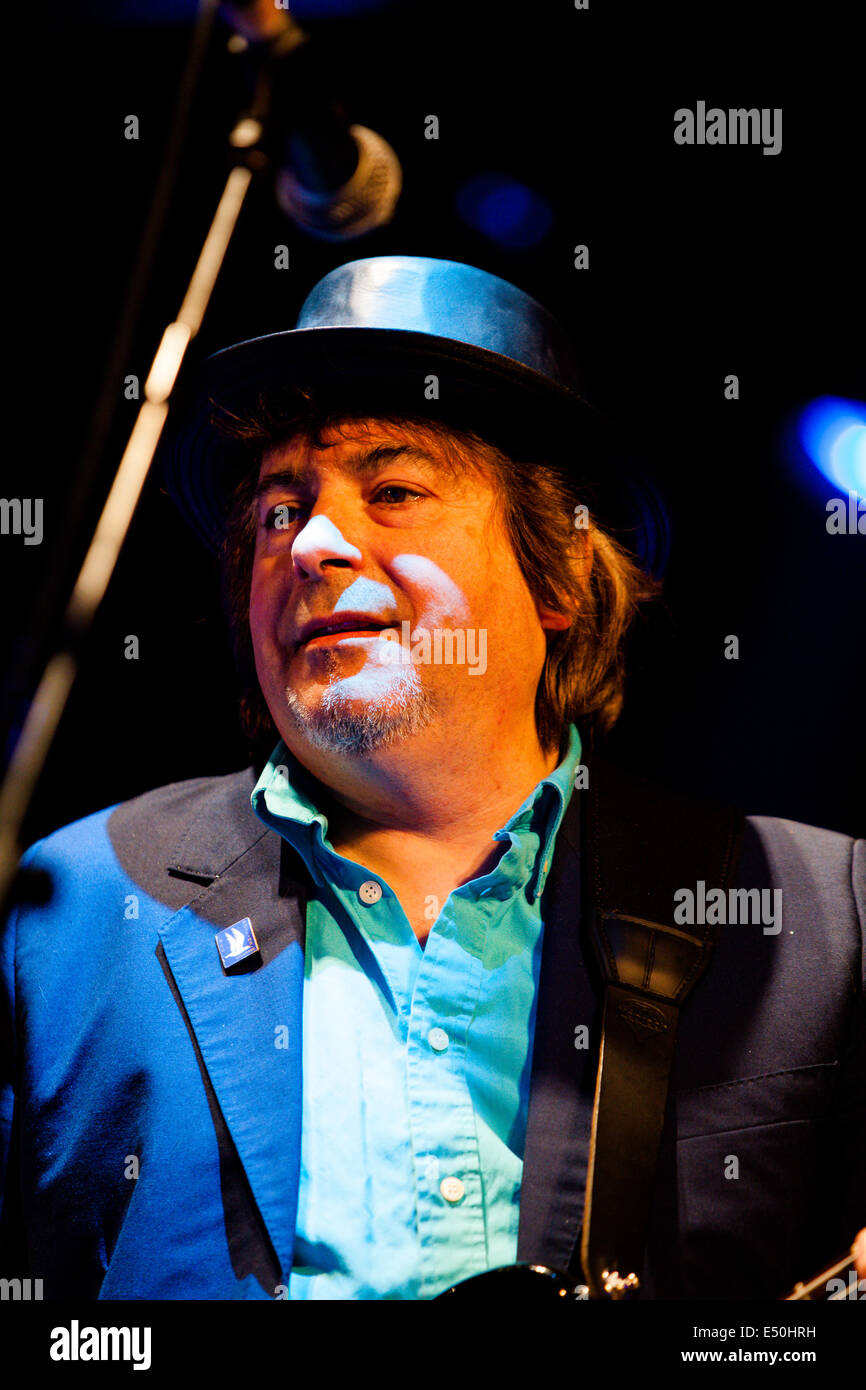 John Bentley performing live with rock band Squeeze at Larmer Tree ...
