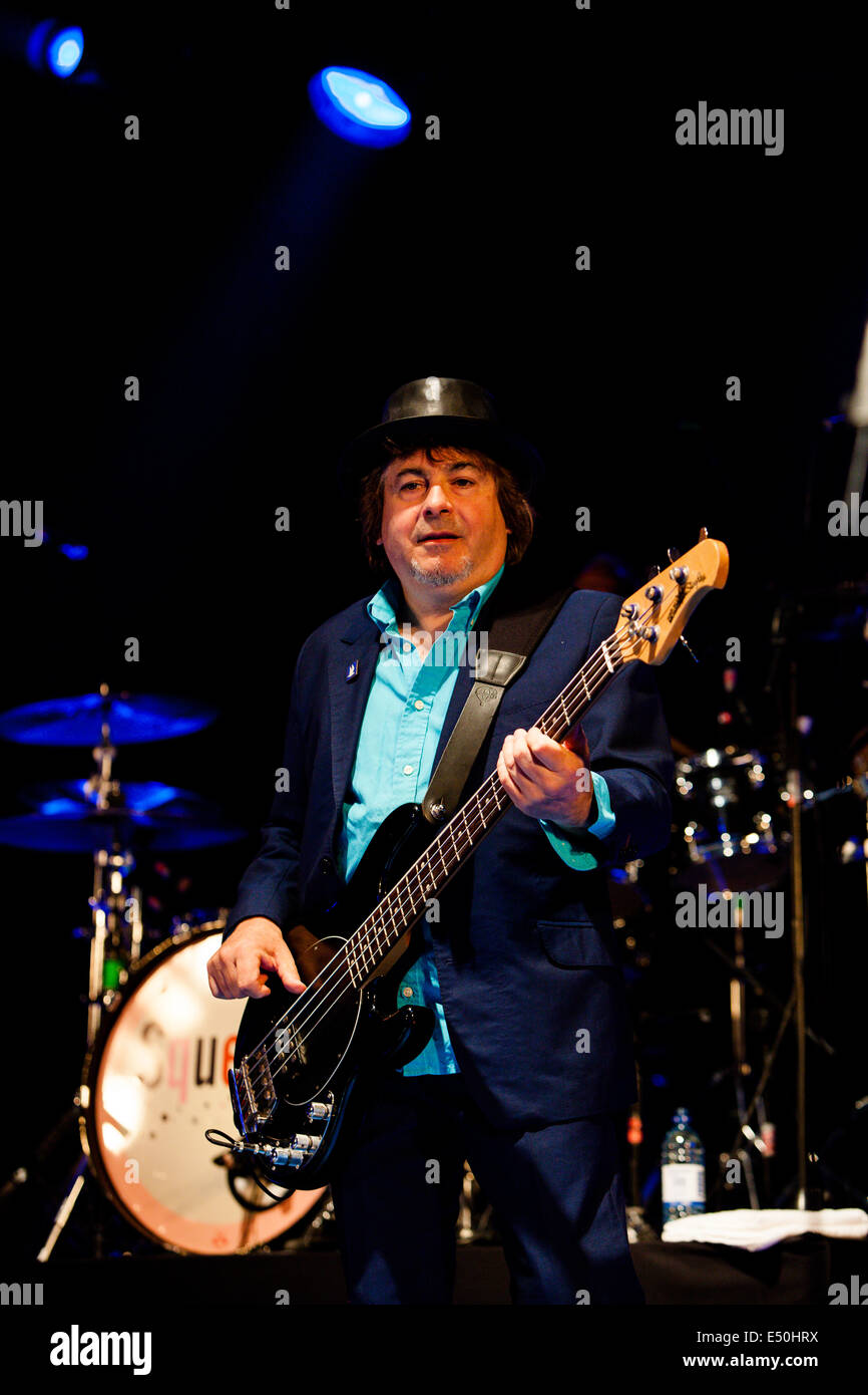 John Bentley performing live with rock band Squeeze at Larmer Tree ...