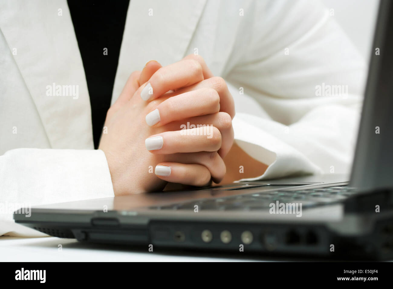 Female hands using laptop Stock Photo - Alamy