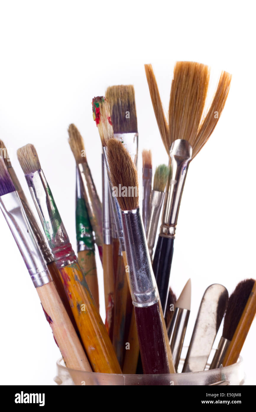 Used paint brushes of different colors Stock Photo - Alamy