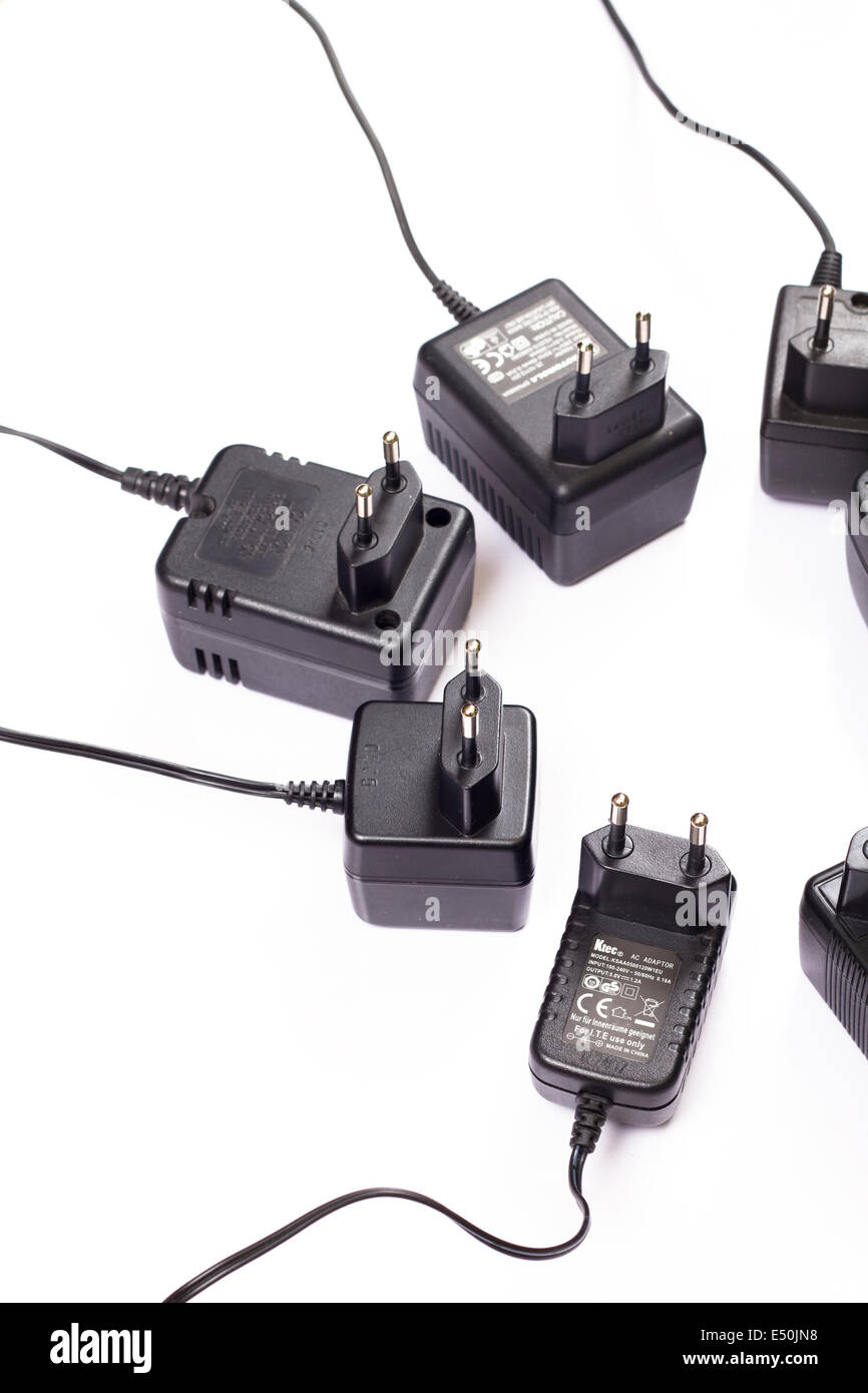 A cell phone chargers on white background Stock Photo - Alamy