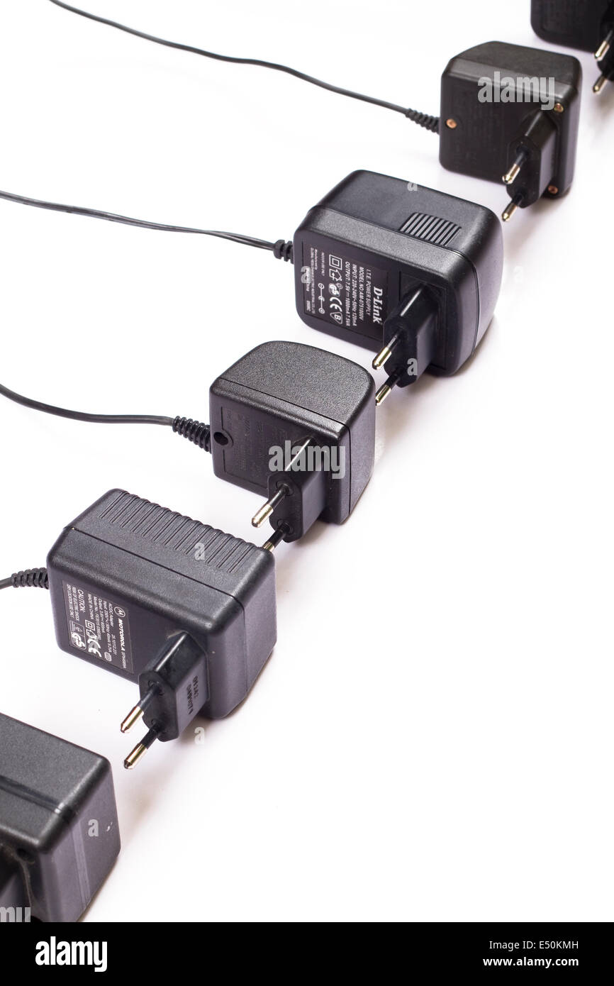 A cell phone chargers on white background Stock Photo - Alamy