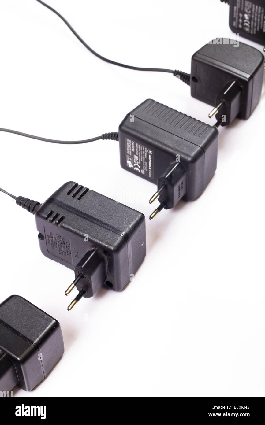 A cell phone chargers on white background Stock Photo - Alamy