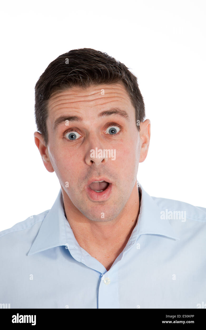 Handsome man with a startled expression Stock Photo - Alamy
