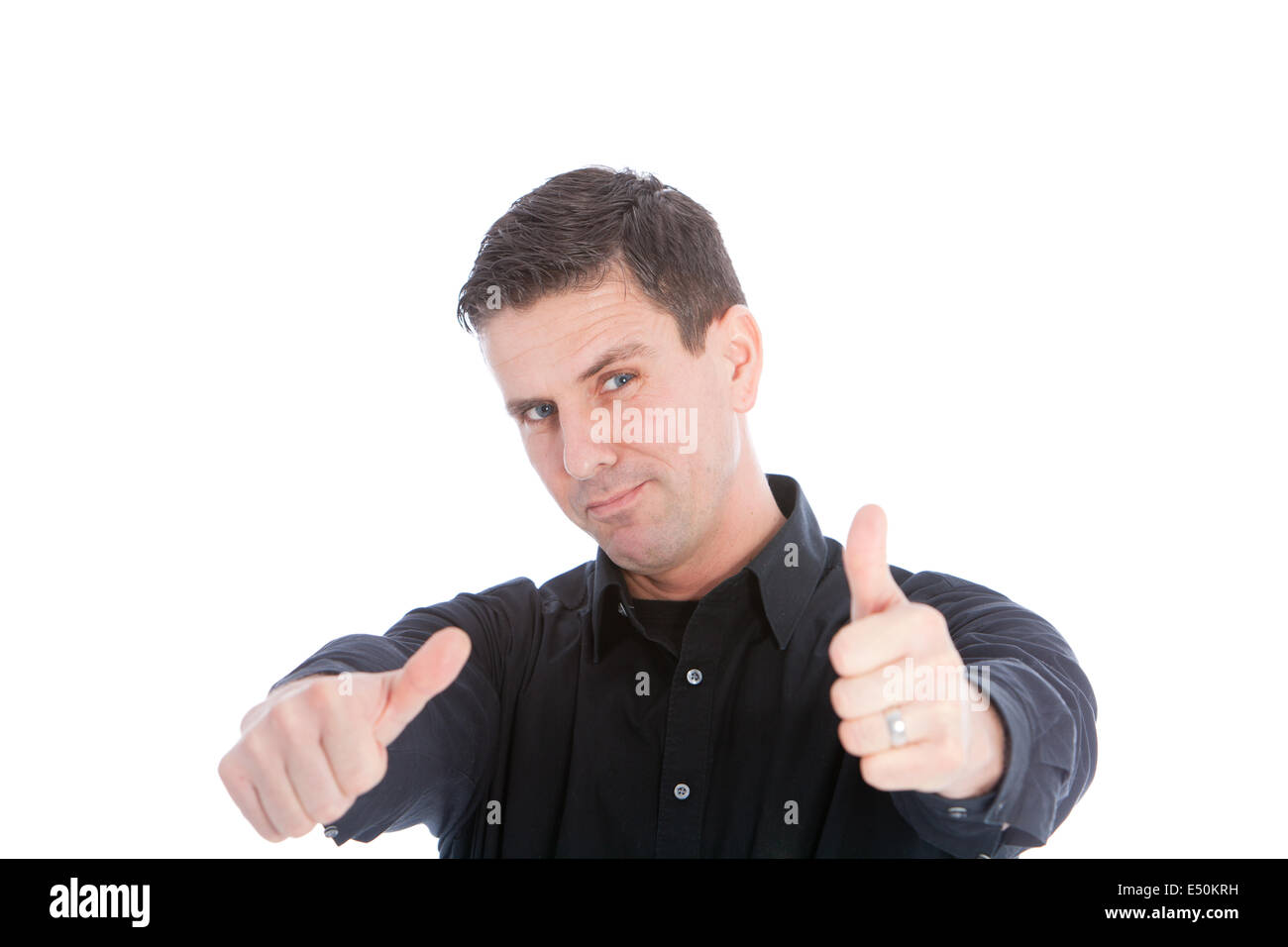 Good looking man giving a thumbs up gesture Stock Photo - Alamy