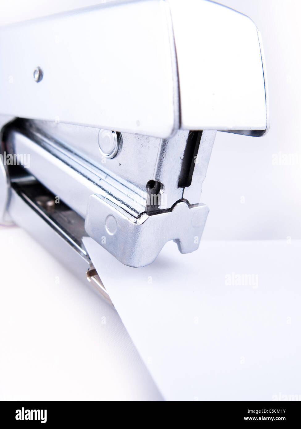 Silver Stapler´s picture over white background Stock Photo - Alamy