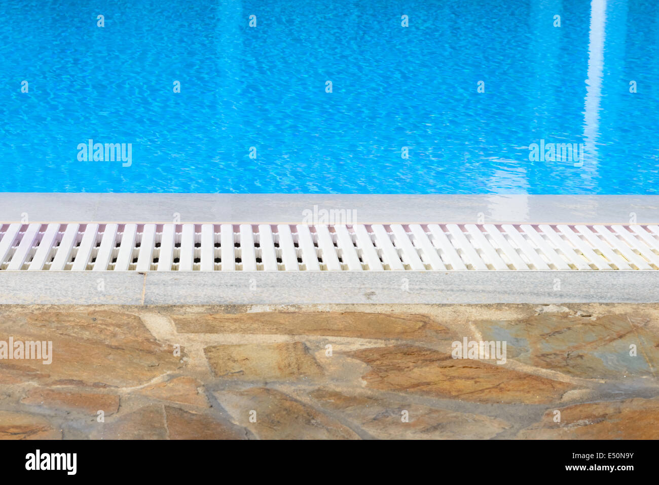 edge of the swimming pool overflow Stock Photo - Alamy