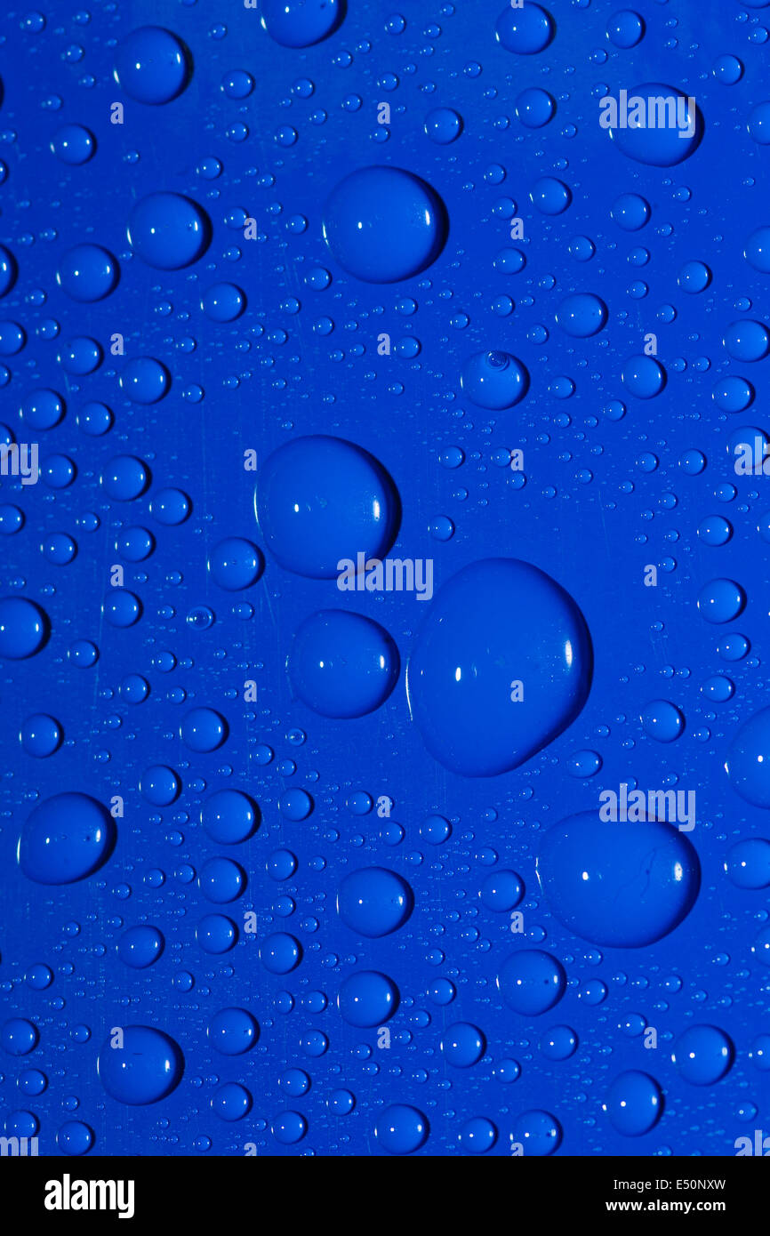 water drops on blue background Stock Photo - Alamy