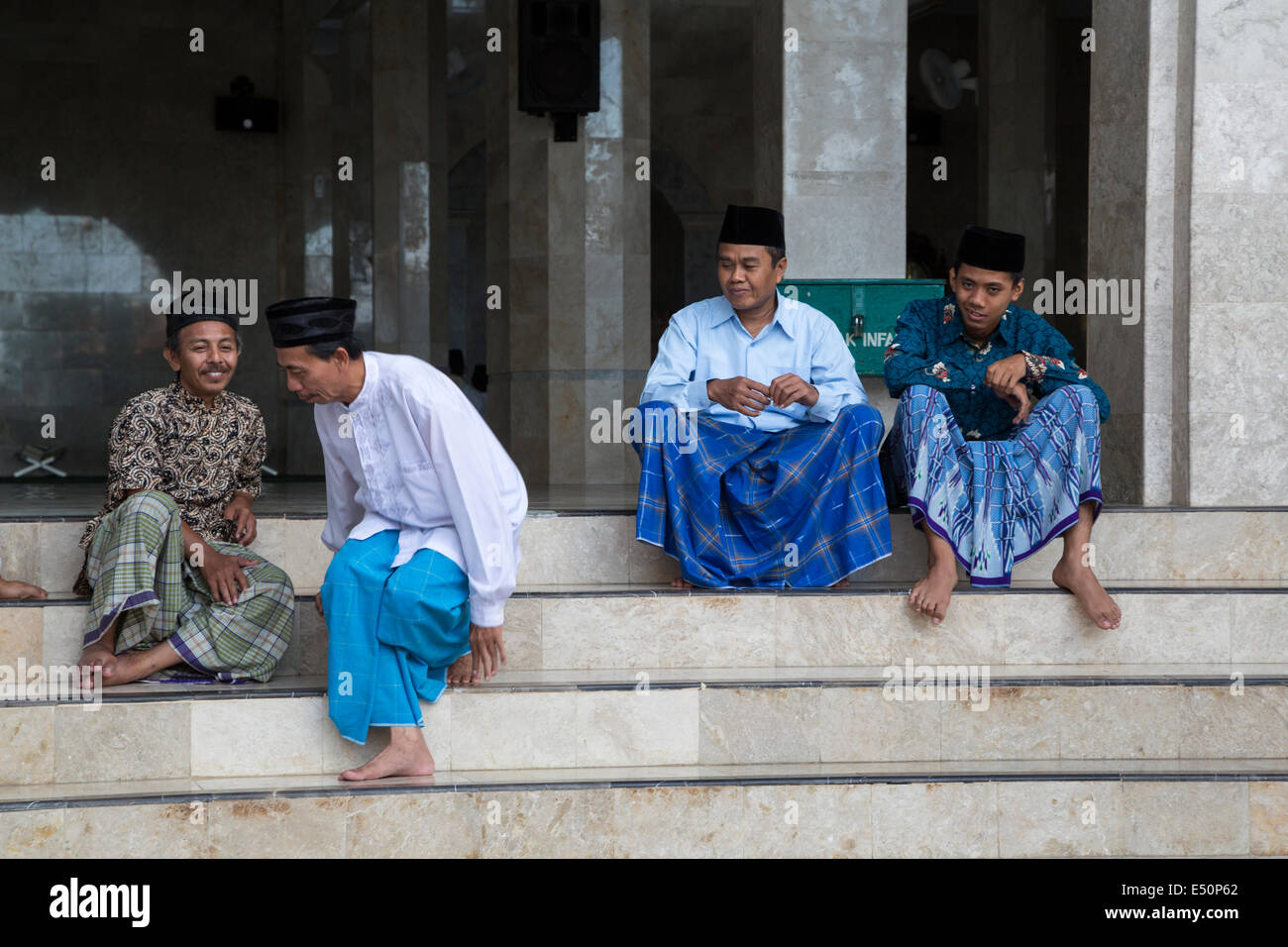 Bali, Indonesia. Balinese Muslims Resting on Mosque Steps after Prayers ...