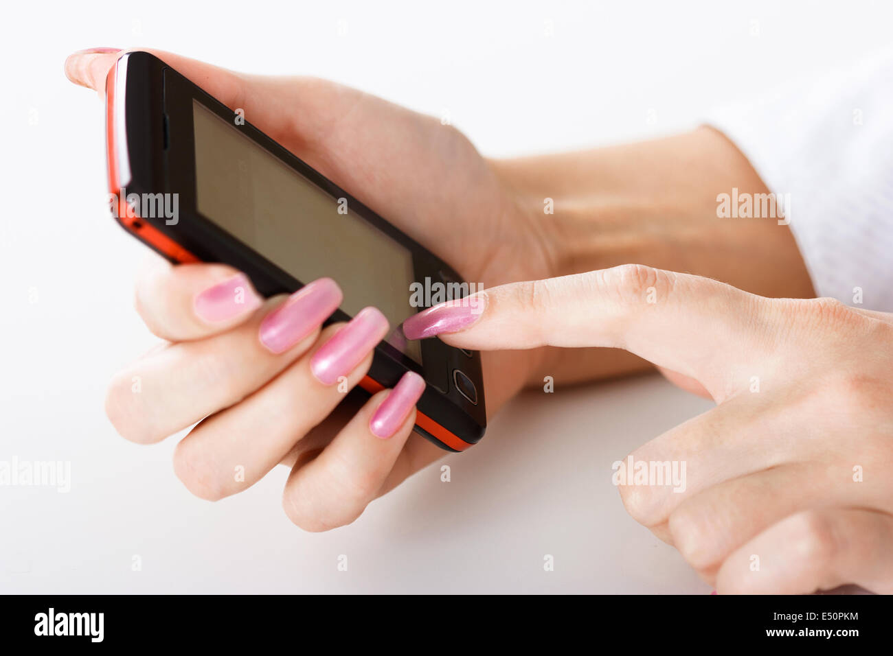 Mobile phone in women hand Stock Photo - Alamy