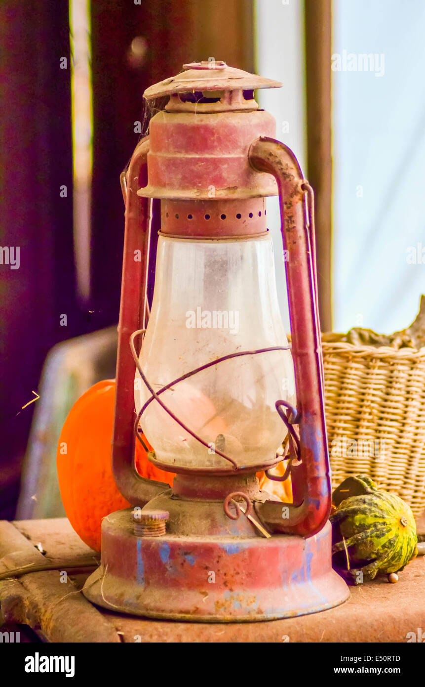 rustic old oil lantern Stock Photo - Alamy