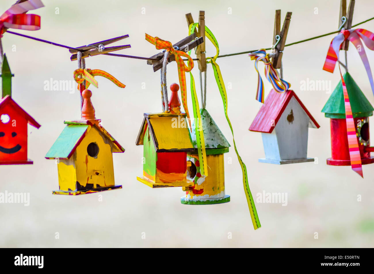 little colorful bird houses Stock Photo - Alamy