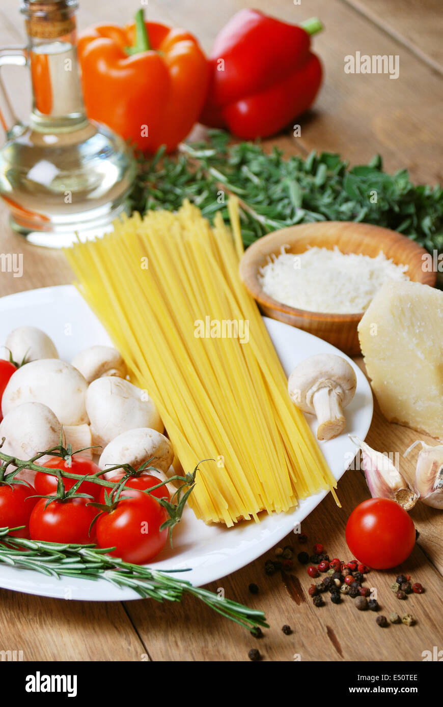 Pasta ingredients on the wooden table Stock Photo - Alamy