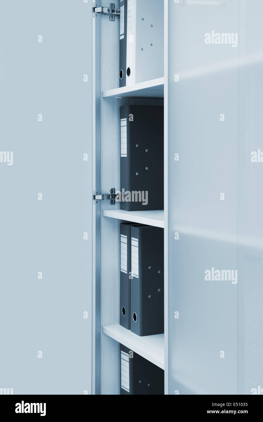 bookcase with folders Stock Photo - Alamy