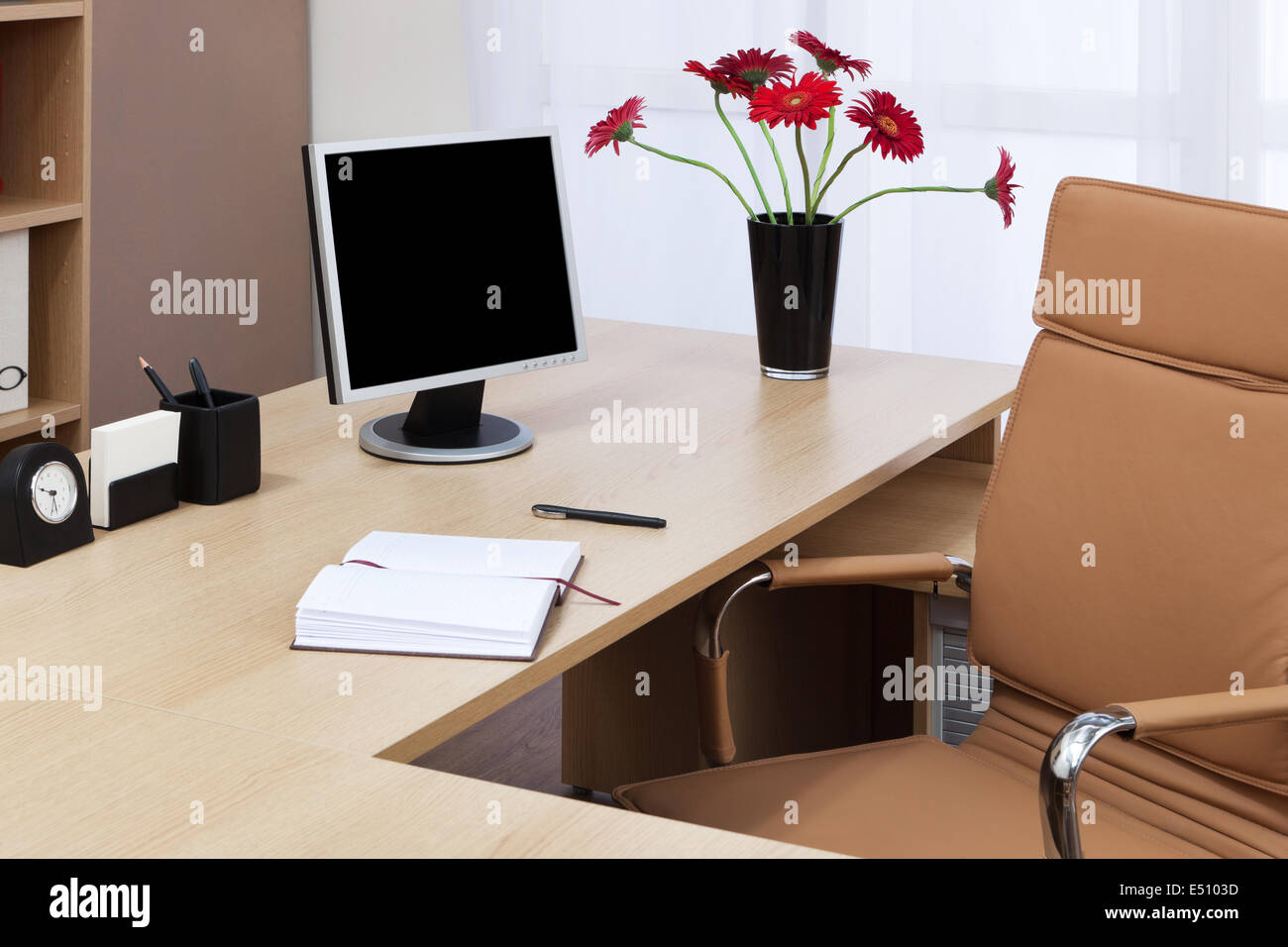 The monitor on a desk Stock Photo - Alamy
