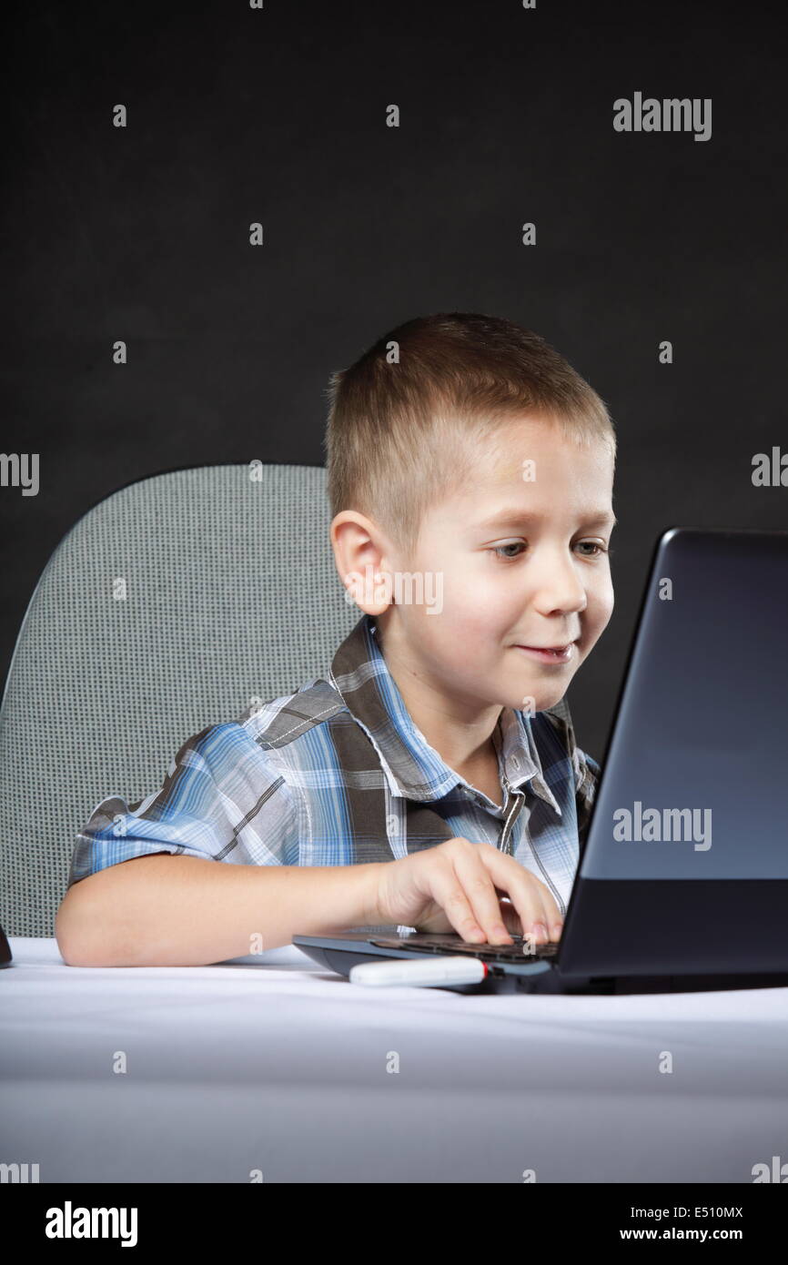 Computer addiction child boy laptop hi-res stock photography and images ...