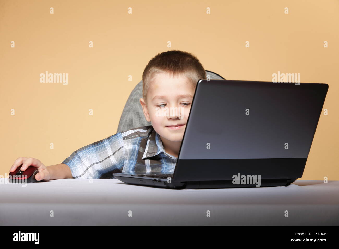 Computer addiction child boy laptop hi-res stock photography and images ...
