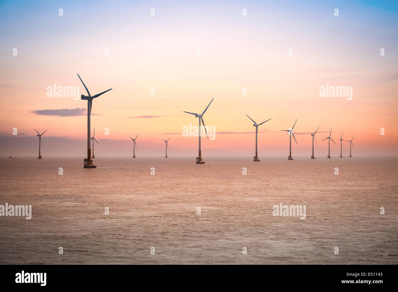offshore wind farm in sunset Stock Photo - Alamy