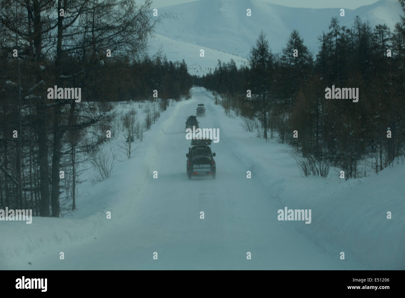 4WD expedition danger road snow desolate mountain Stock Photo - Alamy