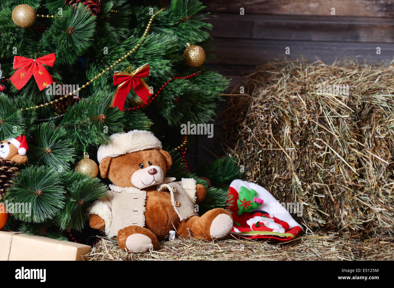 Christmas fur-tree in a rural interior Stock Photo - Alamy