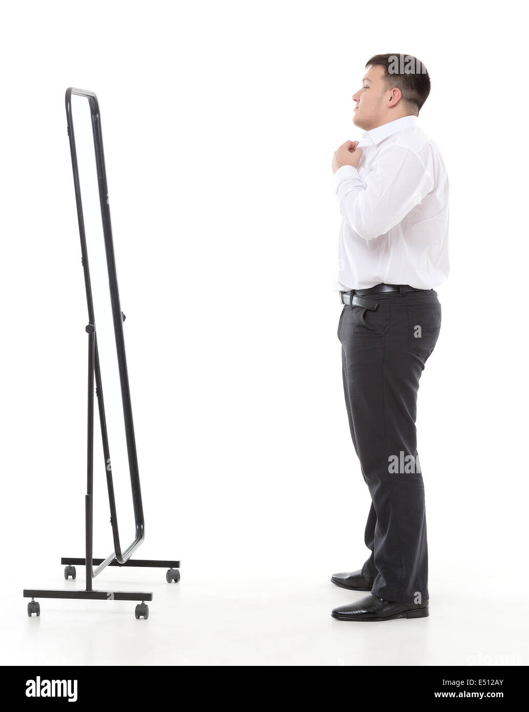 Man reflection mirror standing Cut Out Stock Images & Pictures - Alamy