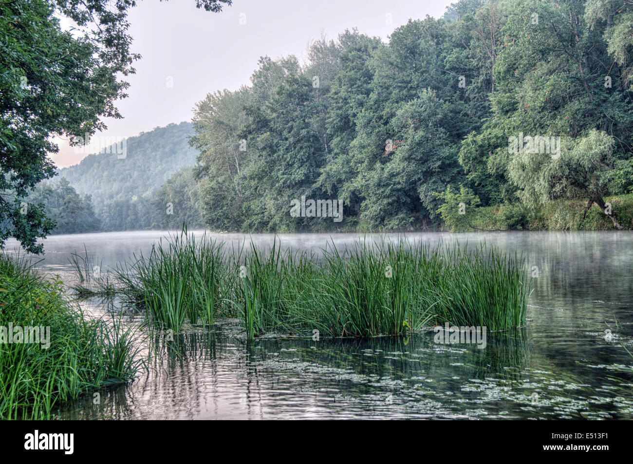 landscape with a river Stock Photo - Alamy