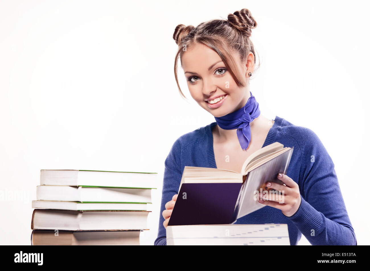 Teenager reading book desk hi-res stock photography and images - Alamy