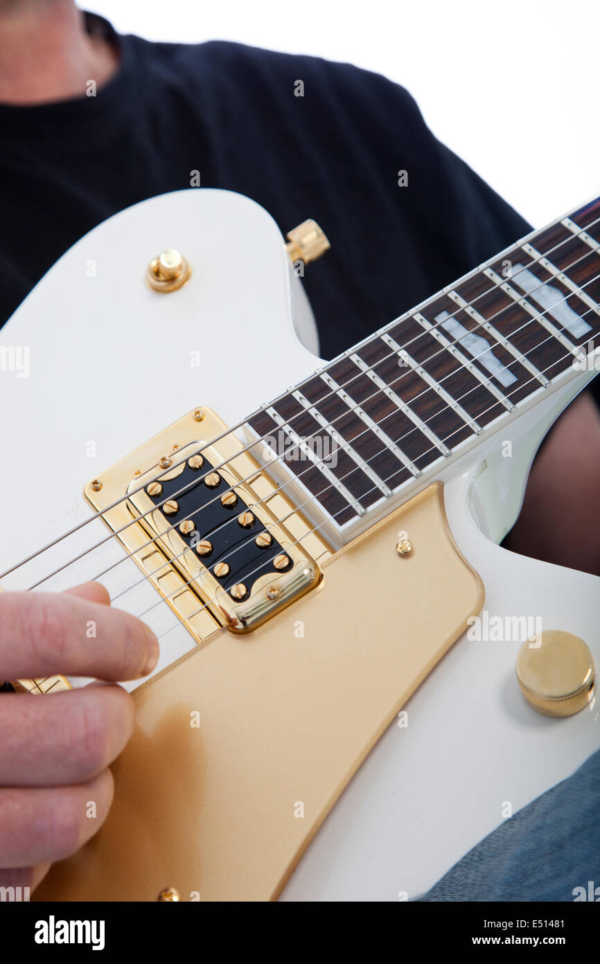 Man playing an electric guitar Stock Photo - Alamy