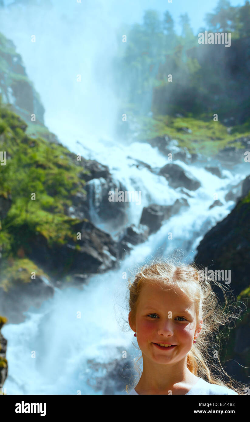 Portrait girl on summer waterfall background Stock Photo - Alamy