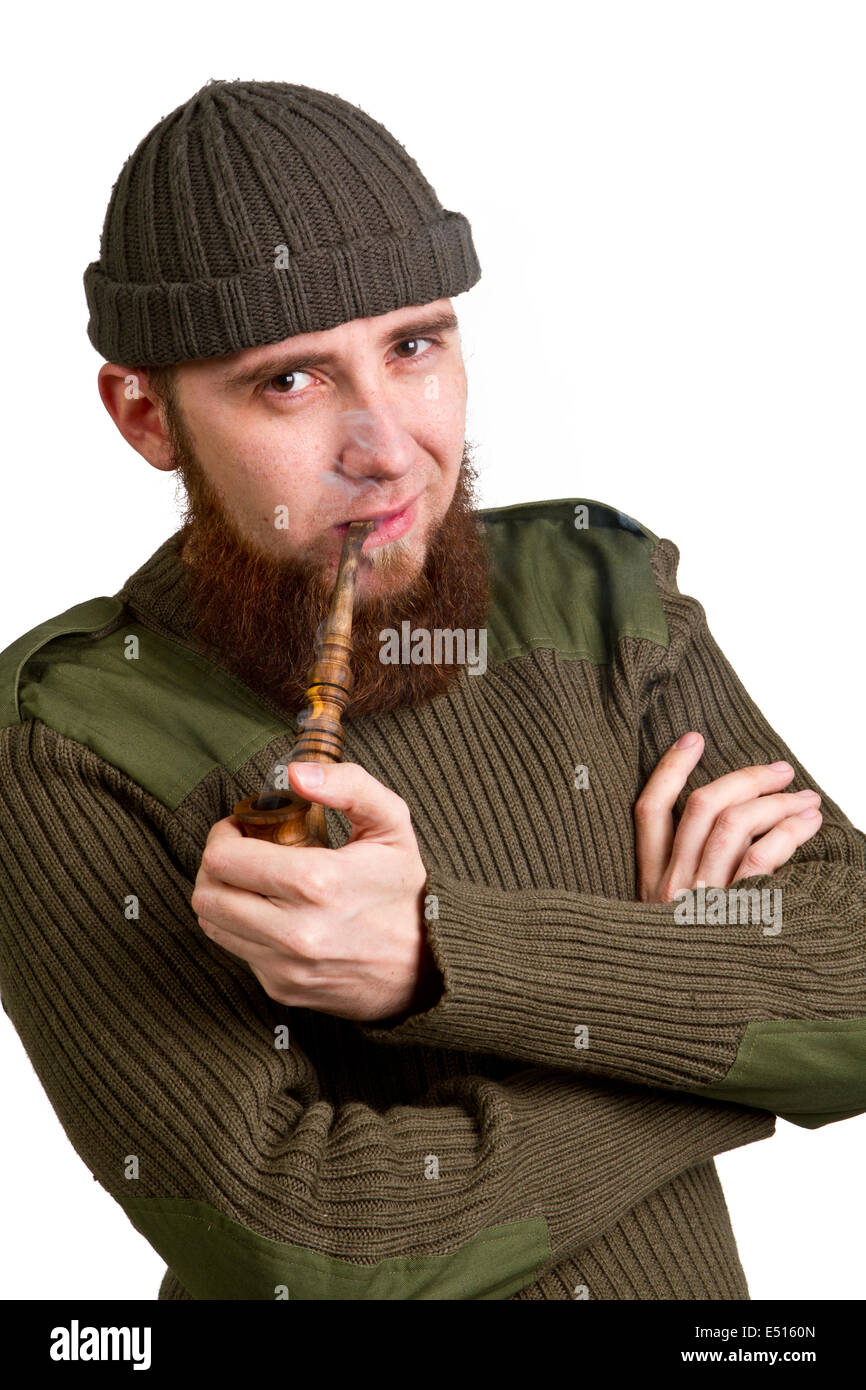 bearded guy smoking a pipe Stock Photo - Alamy