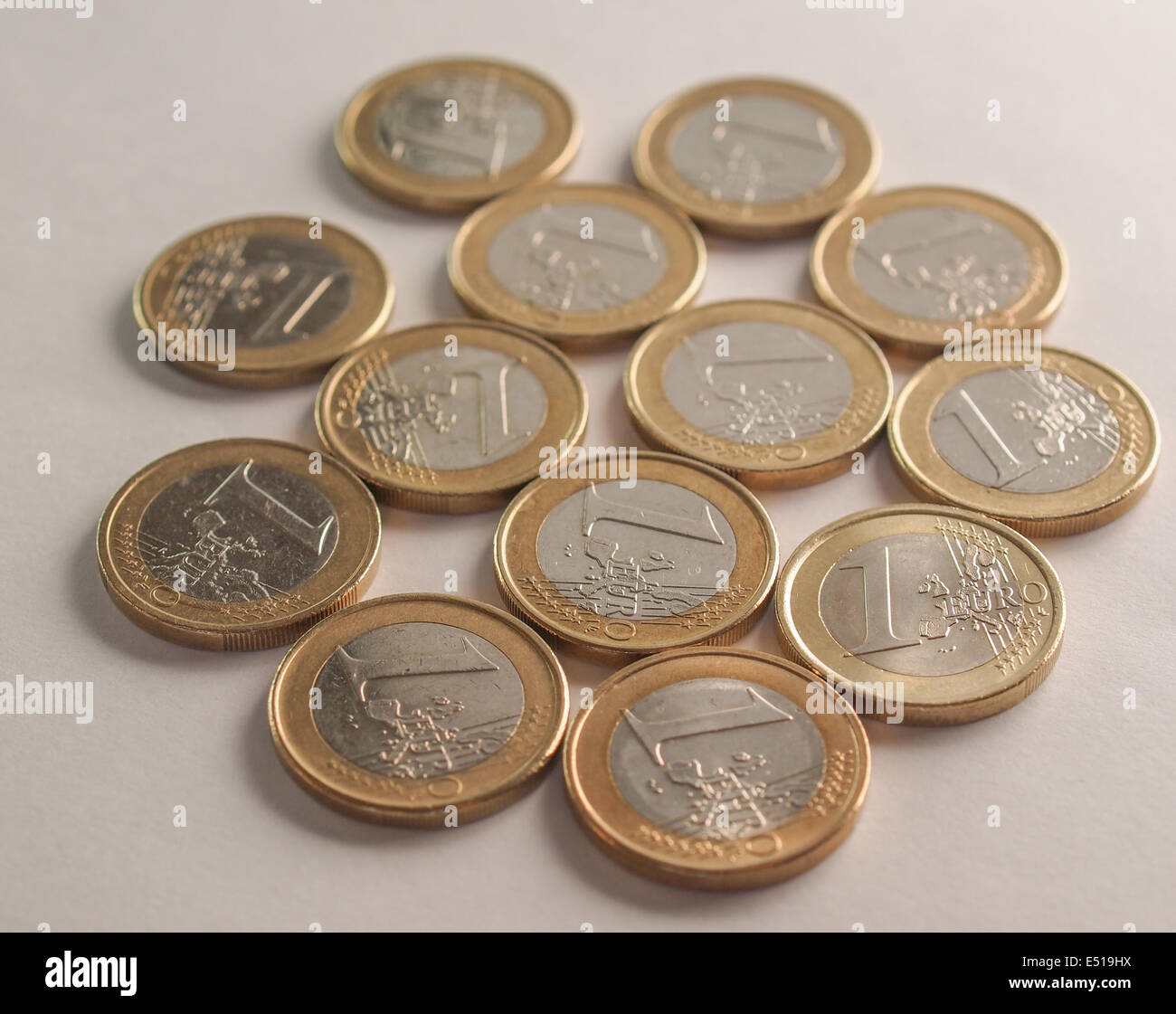 Many one Euro coins Stock Photo - Alamy