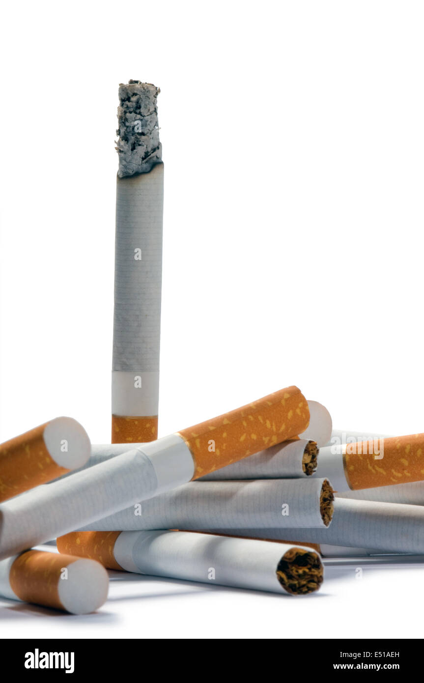 cigarettes lying on a white background Stock Photo - Alamy
