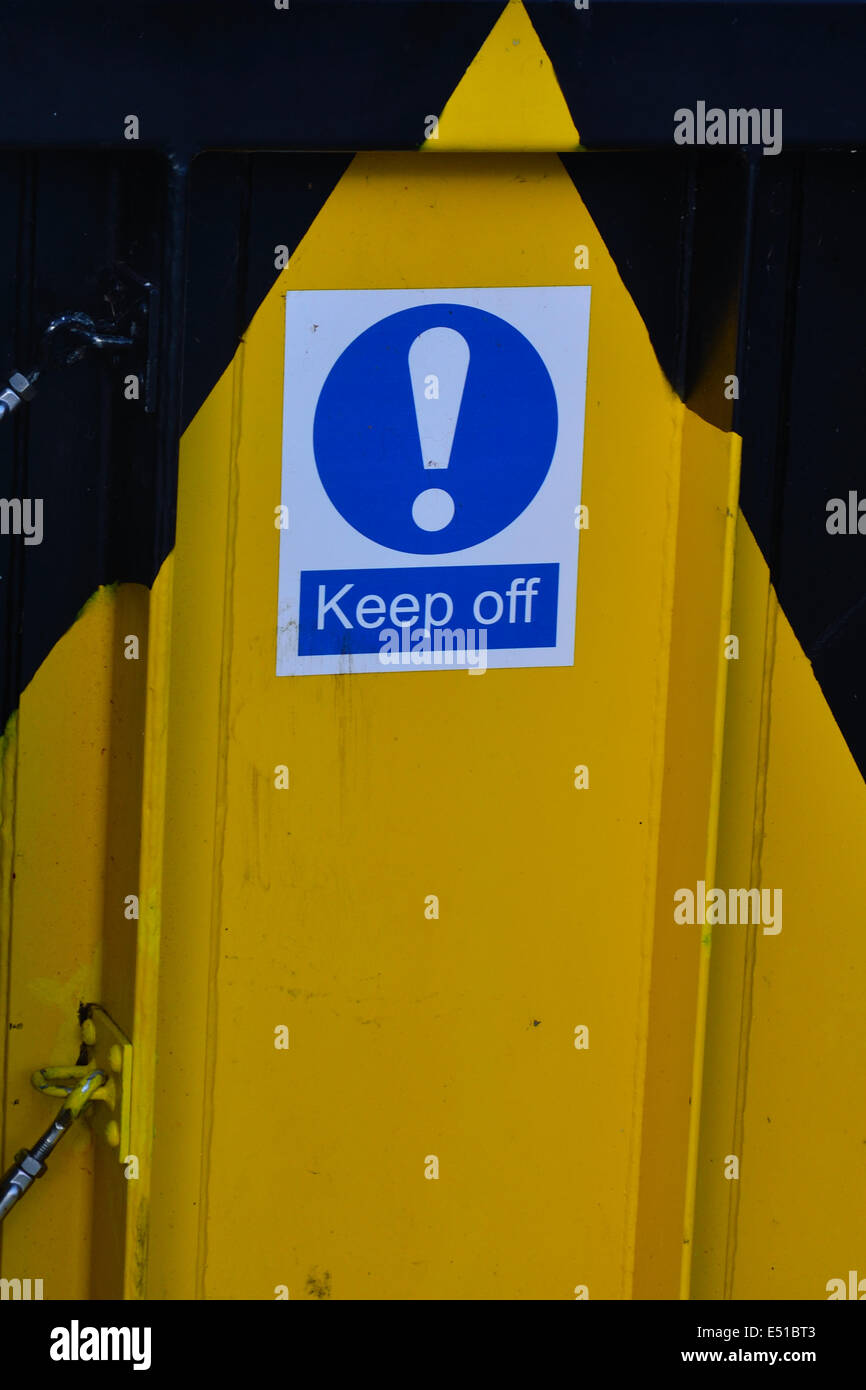 Warning sign to keep off Stock Photo - Alamy