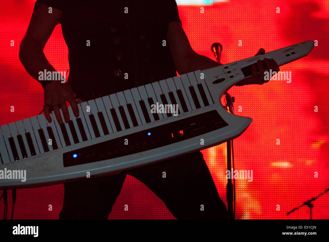 man playing on a synthesizer Stock Photo - Alamy