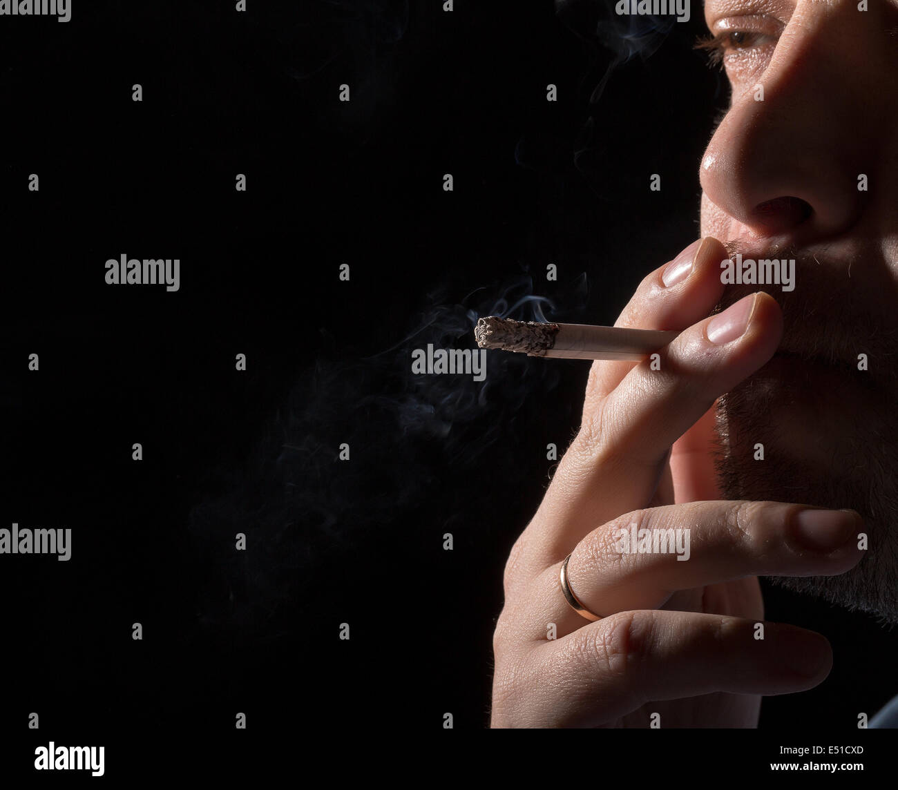 Portrait man smoking cigarette Stock Photo - Alamy