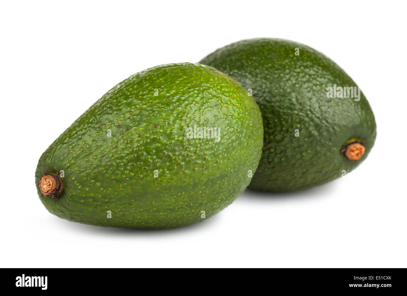 Two green avocado Stock Photo - Alamy