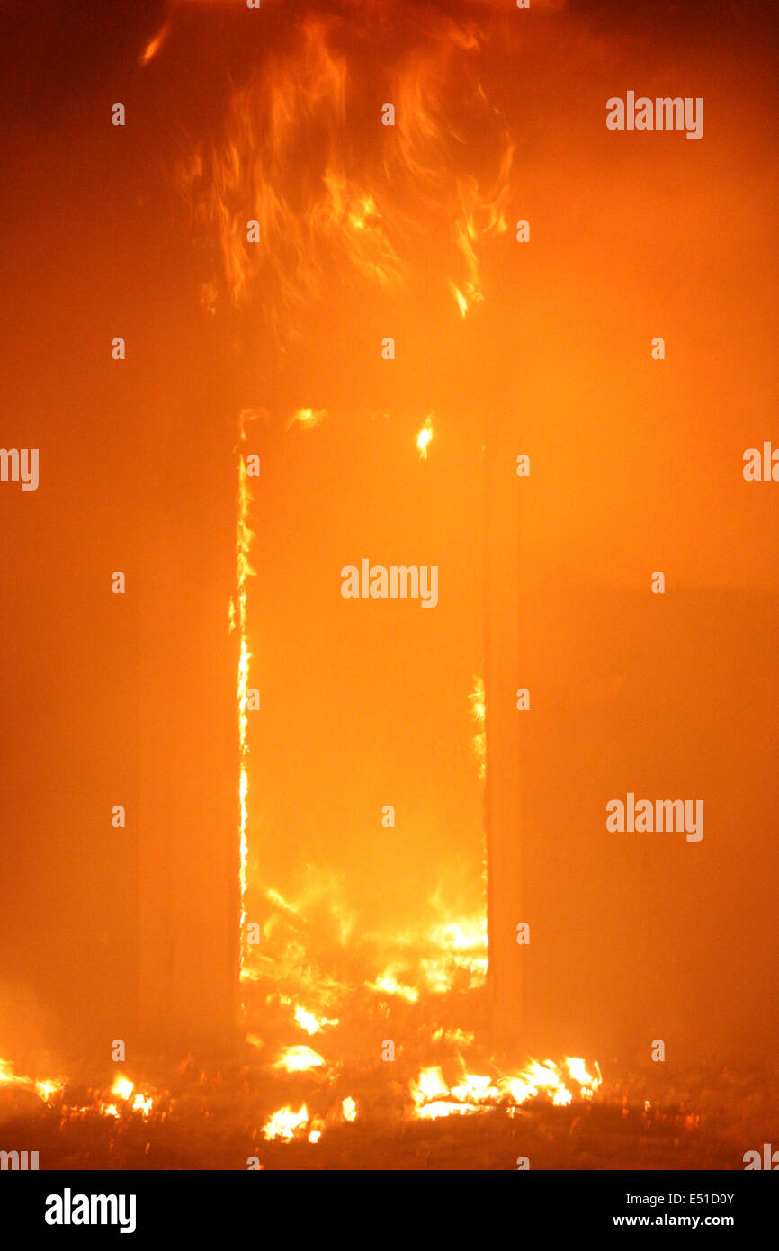 Old building in full flaming inferno Stock Photo - Alamy