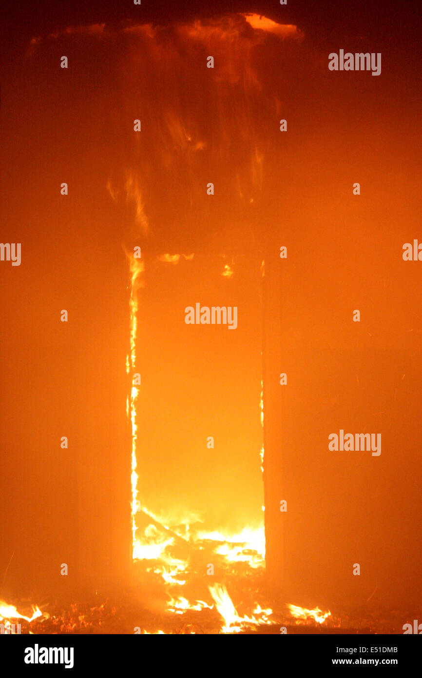 Old building in full flaming inferno Stock Photo - Alamy