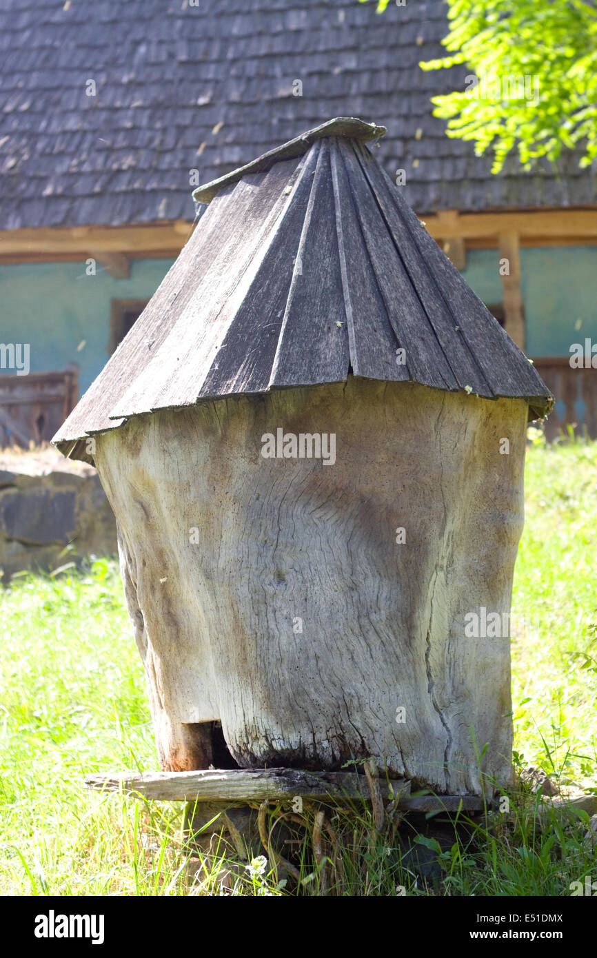 old hive in the garden Stock Photo - Alamy
