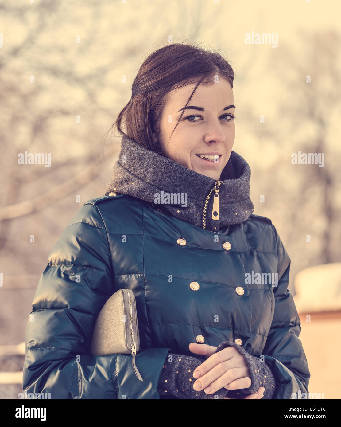 Portrait of young brunette girl in jacket Stock Photo - Alamy