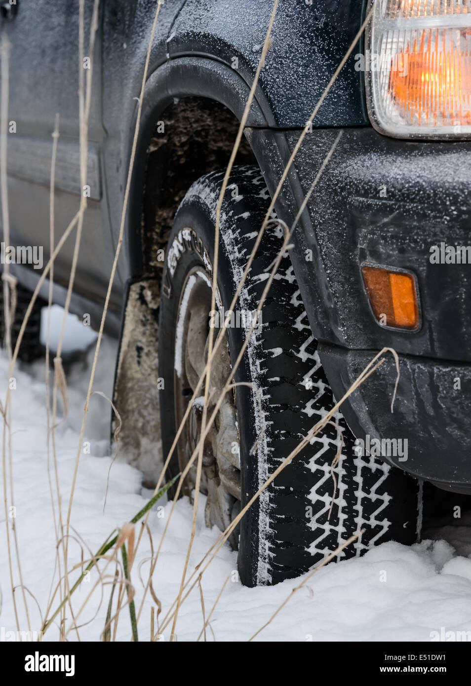 wheel in deep winter snow snowbank Stock Photo - Alamy