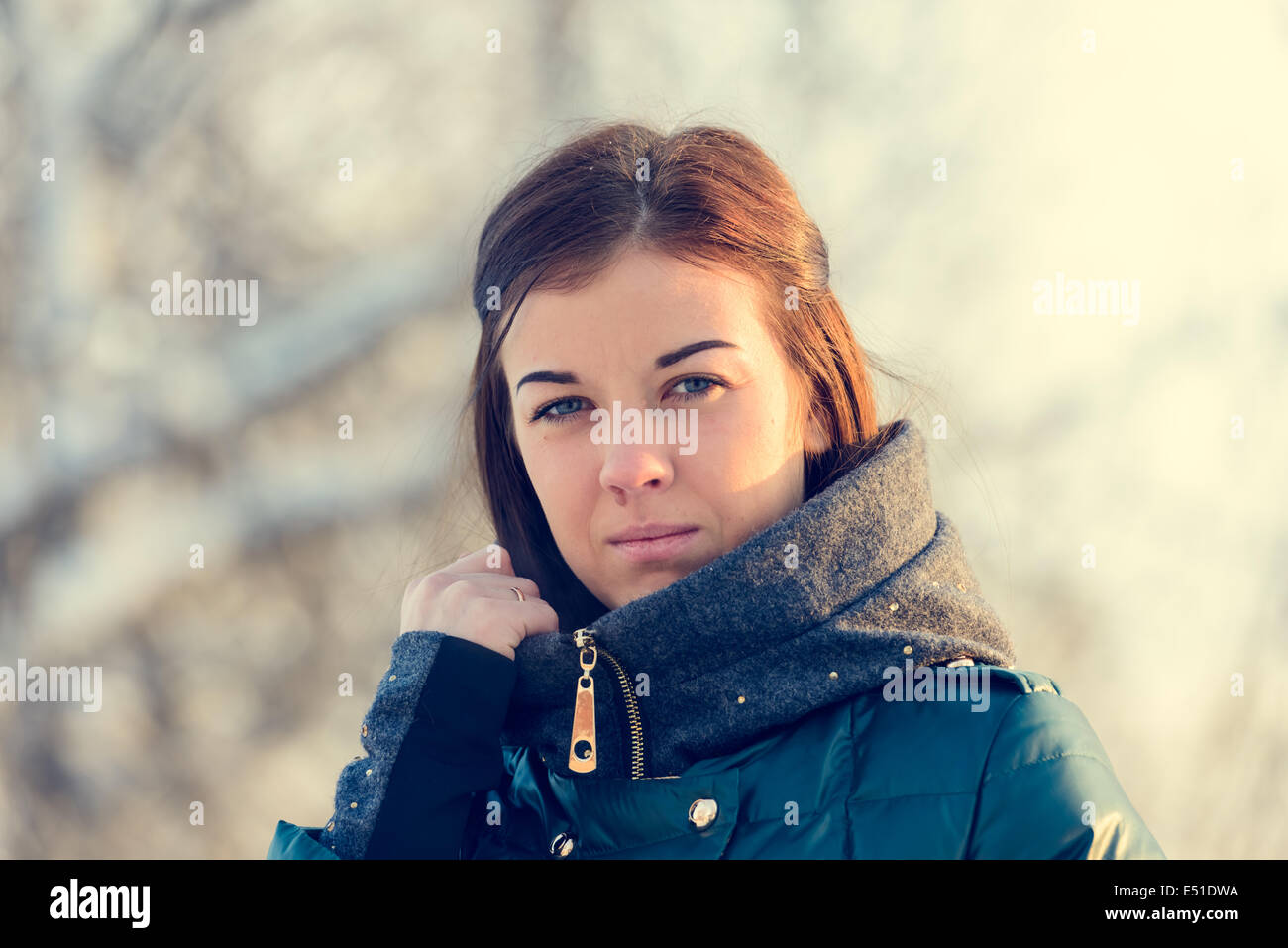 Portrait of young brunette girl in jacket Stock Photo - Alamy