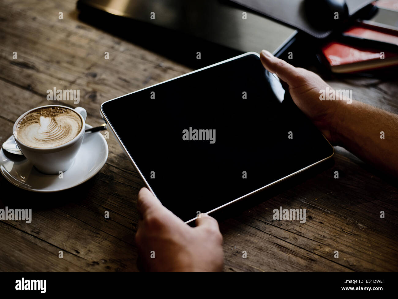 hands holding tablet computer Stock Photo - Alamy