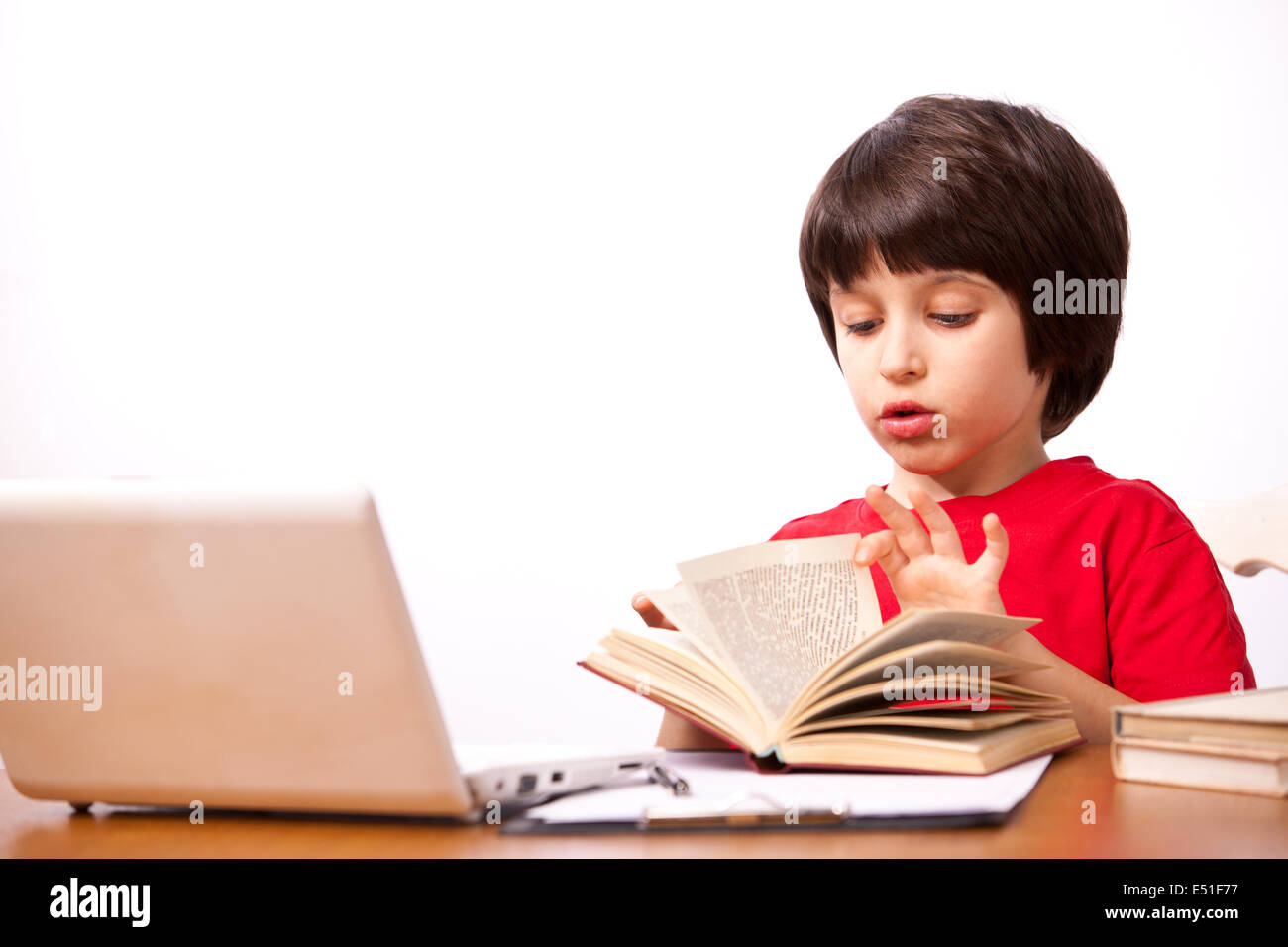 child reading a textbook Stock Photo - Alamy