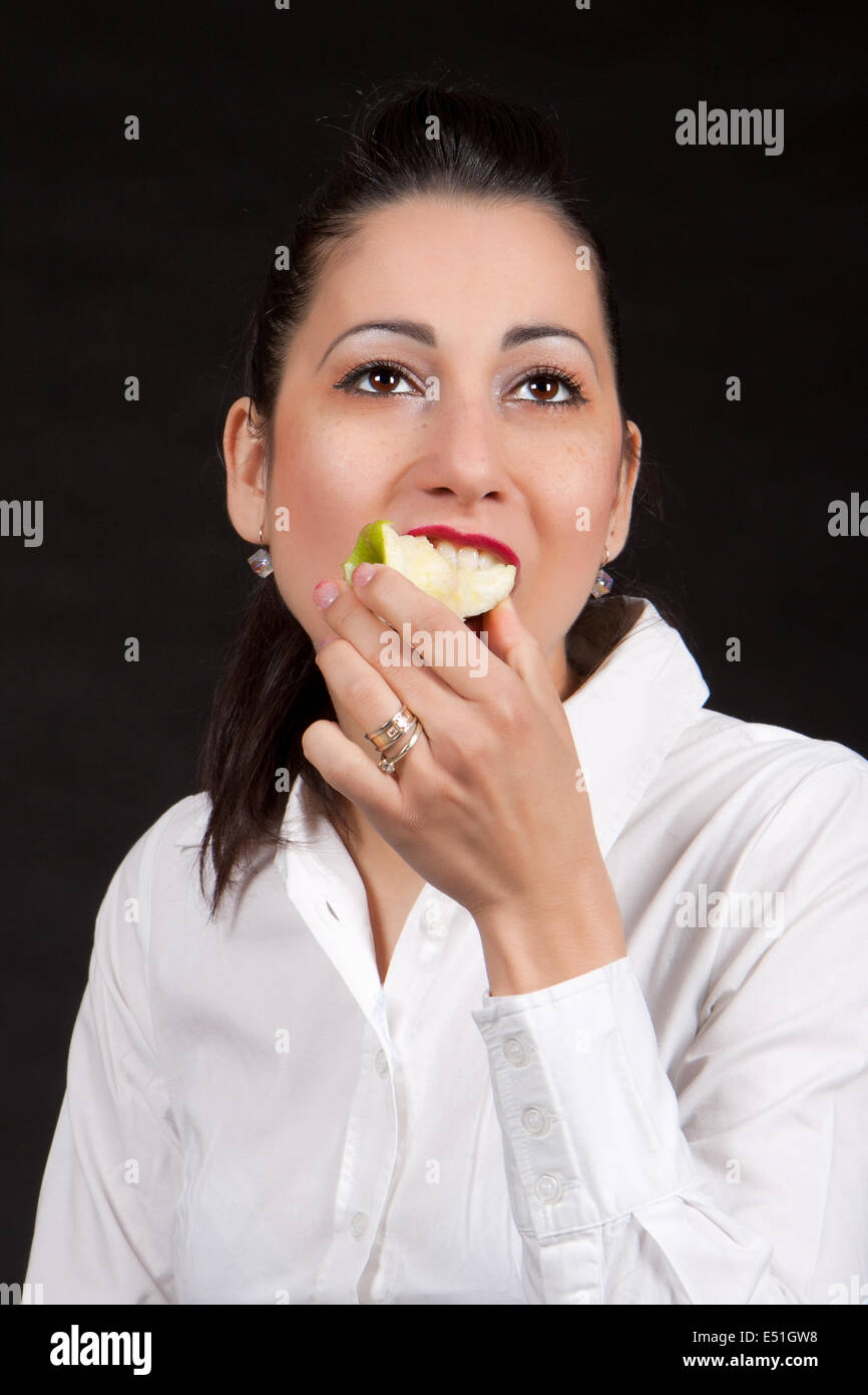 woman eat green apple Stock Photo - Alamy