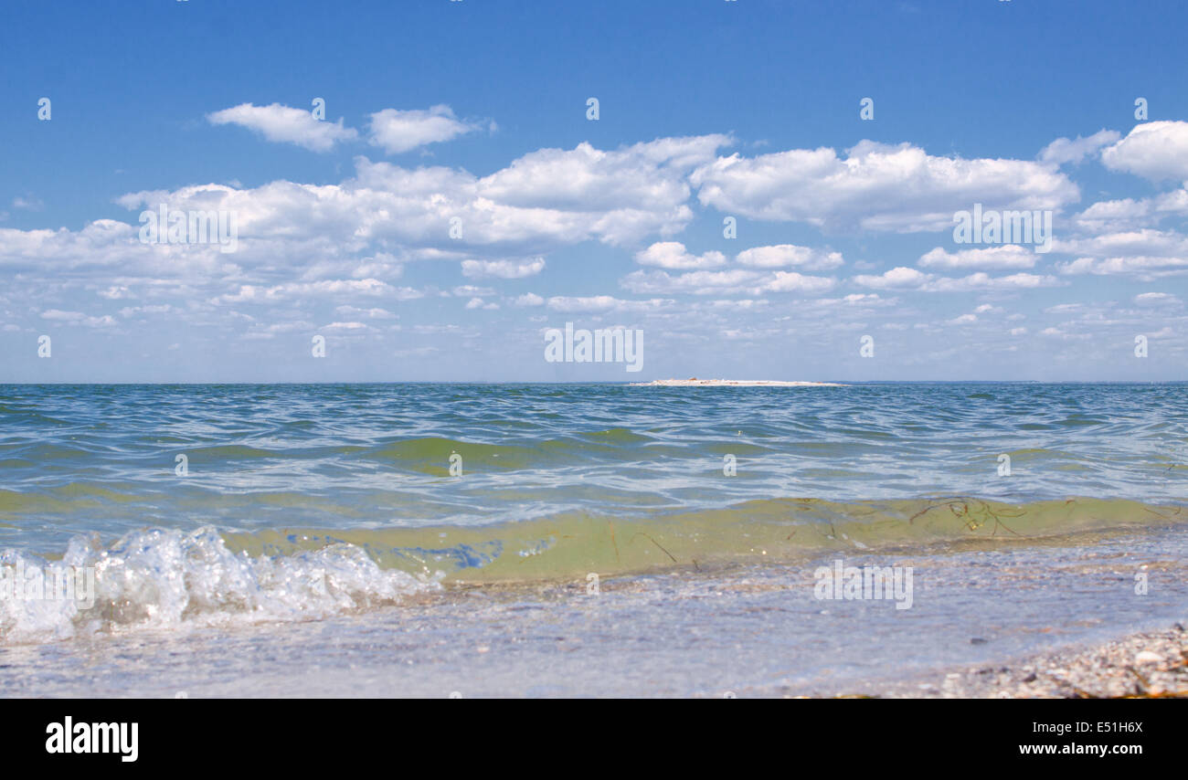 Blue sky pebbles sea hi-res stock photography and images - Alamy