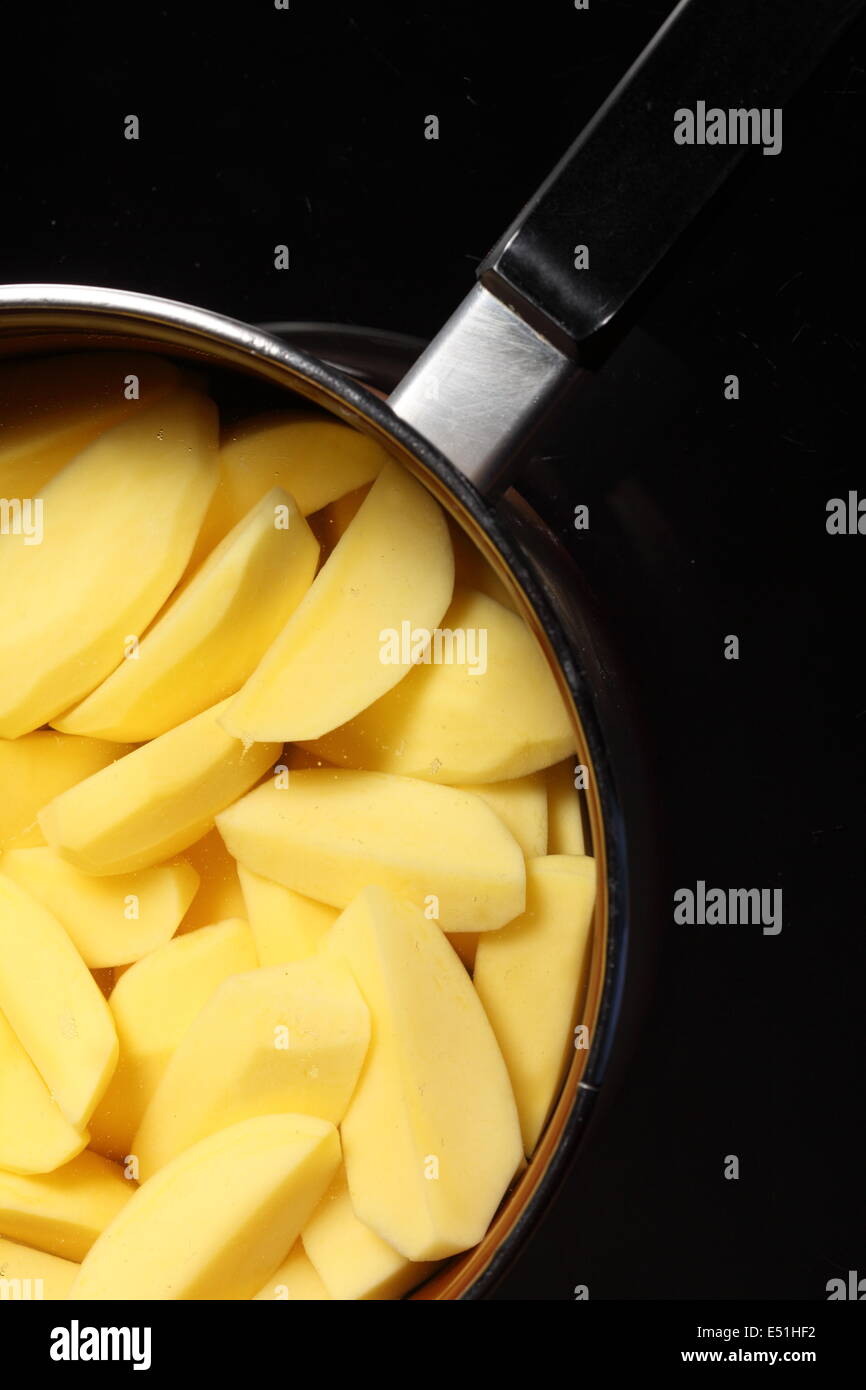 Raw peeled potatoes hi-res stock photography and images - Alamy