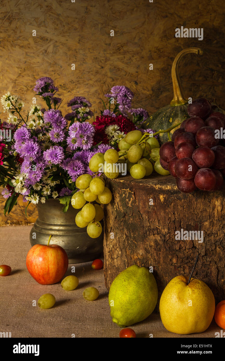 Still Life Fruits were placed on the timber with a beautiful vase of ...