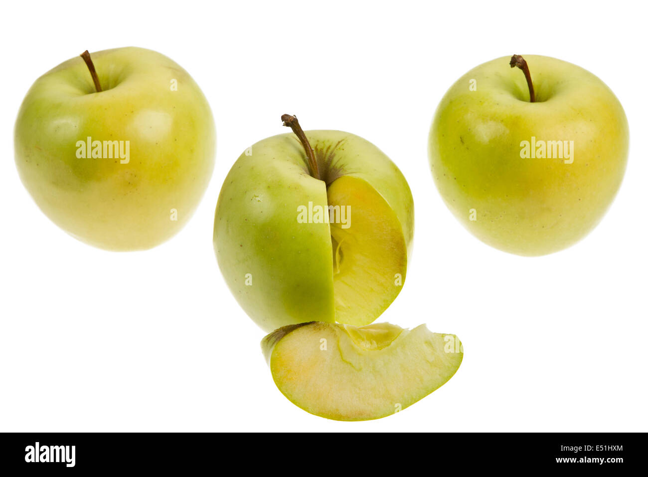 Three green apples on white background Stock Photo - Alamy