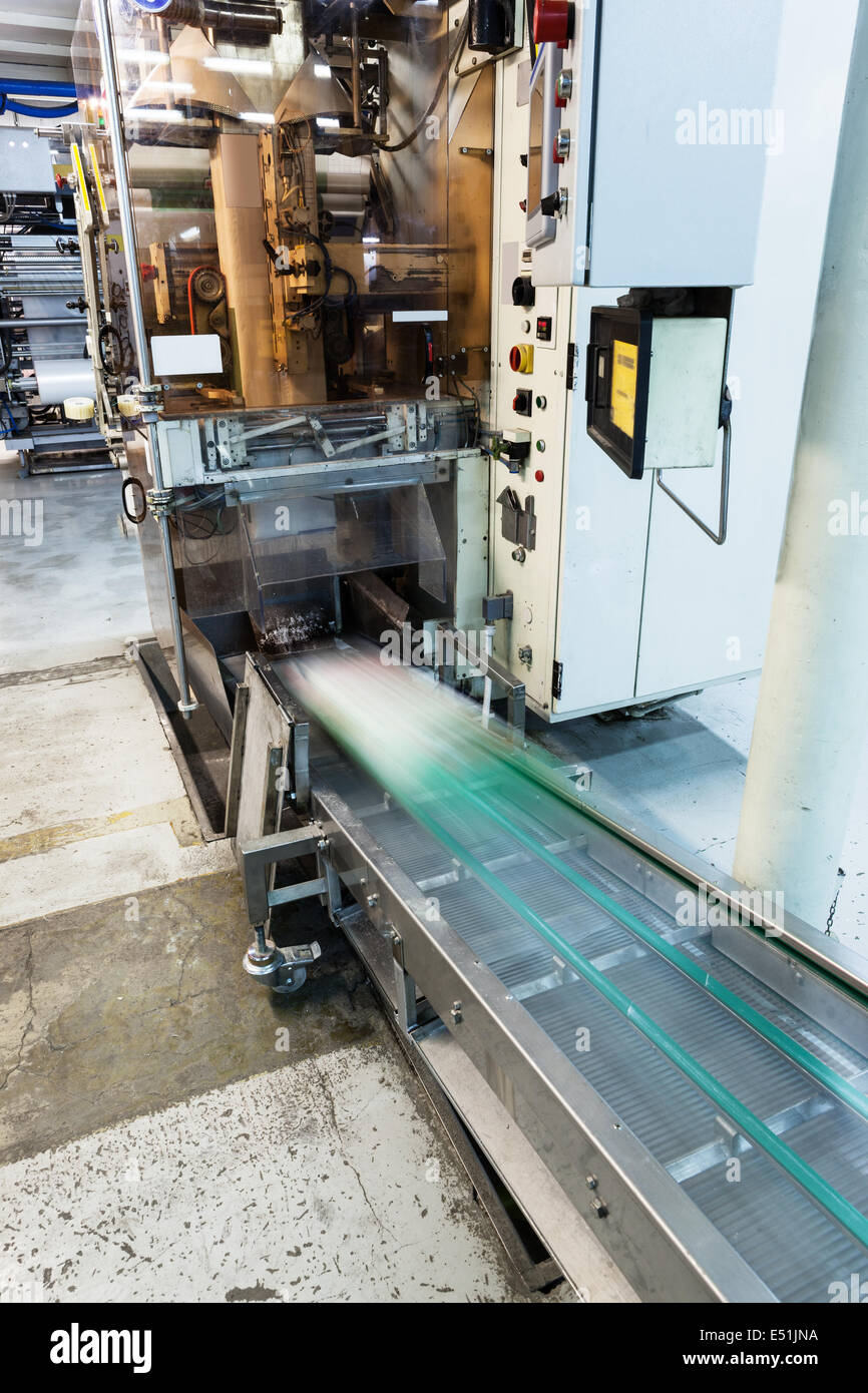 Moving conveyor hi-res stock photography and images - Alamy